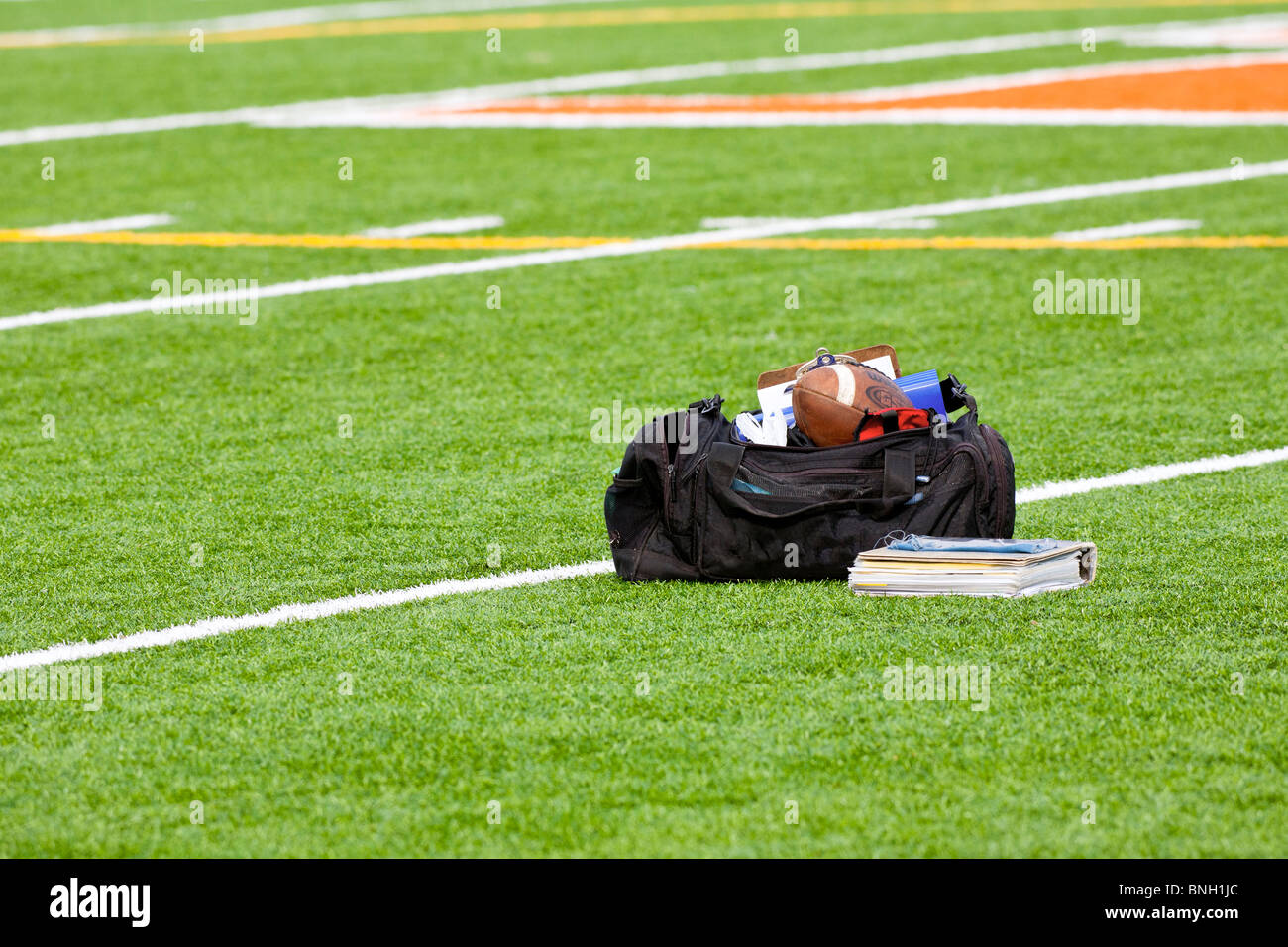 Athletic bag on football field Stock Photo - Alamy