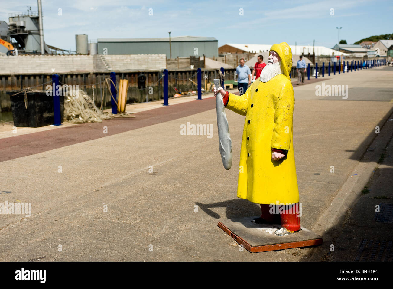 A fishmonger statue in Whitstable Harbour in Kent Stock Photo - Alamy
