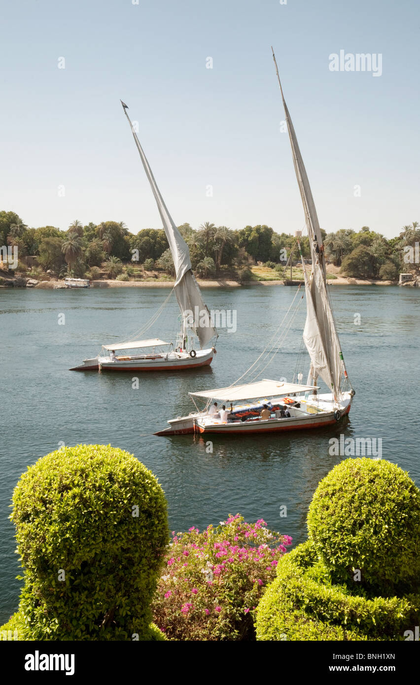 Felucca Nile; Two Feluccas sailing on the river Nile at Aswan, Upper ...