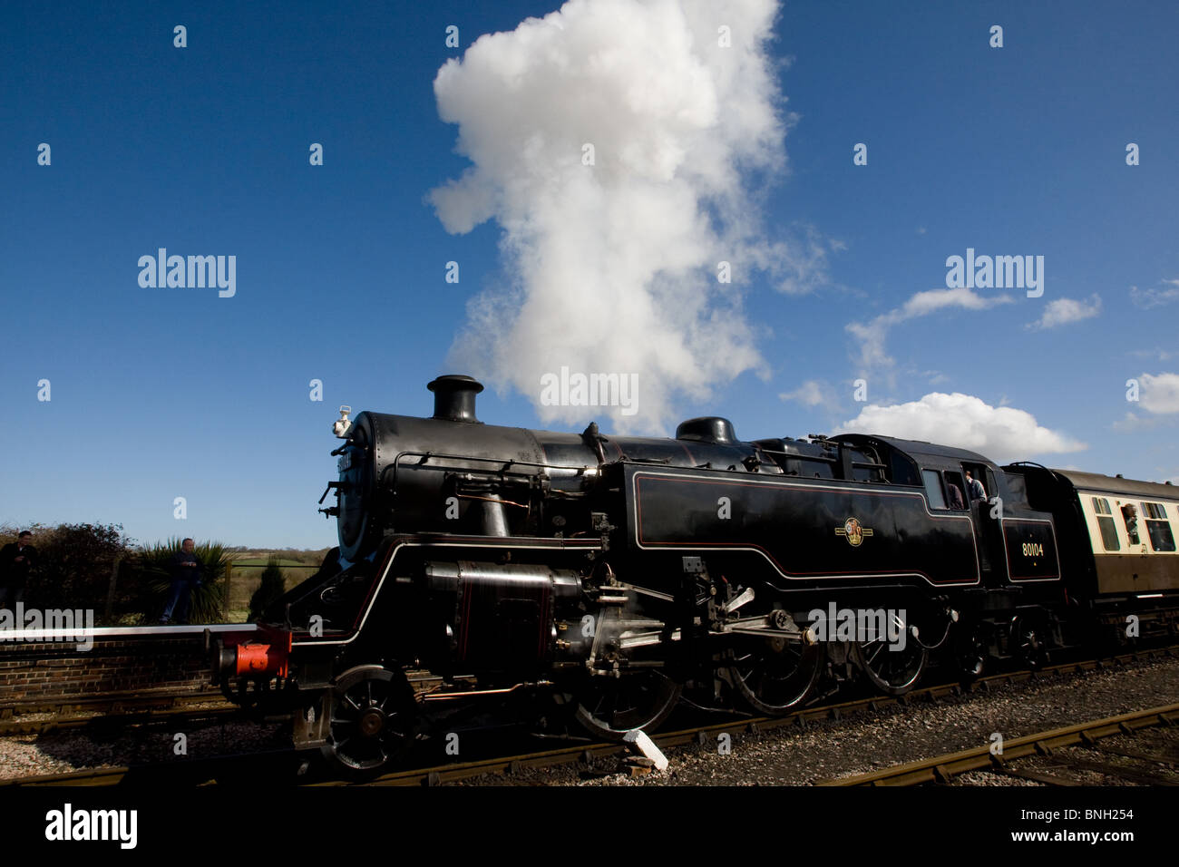 BR Standard class 4 tank engine 80104 leaves Williton Station Somerset ...