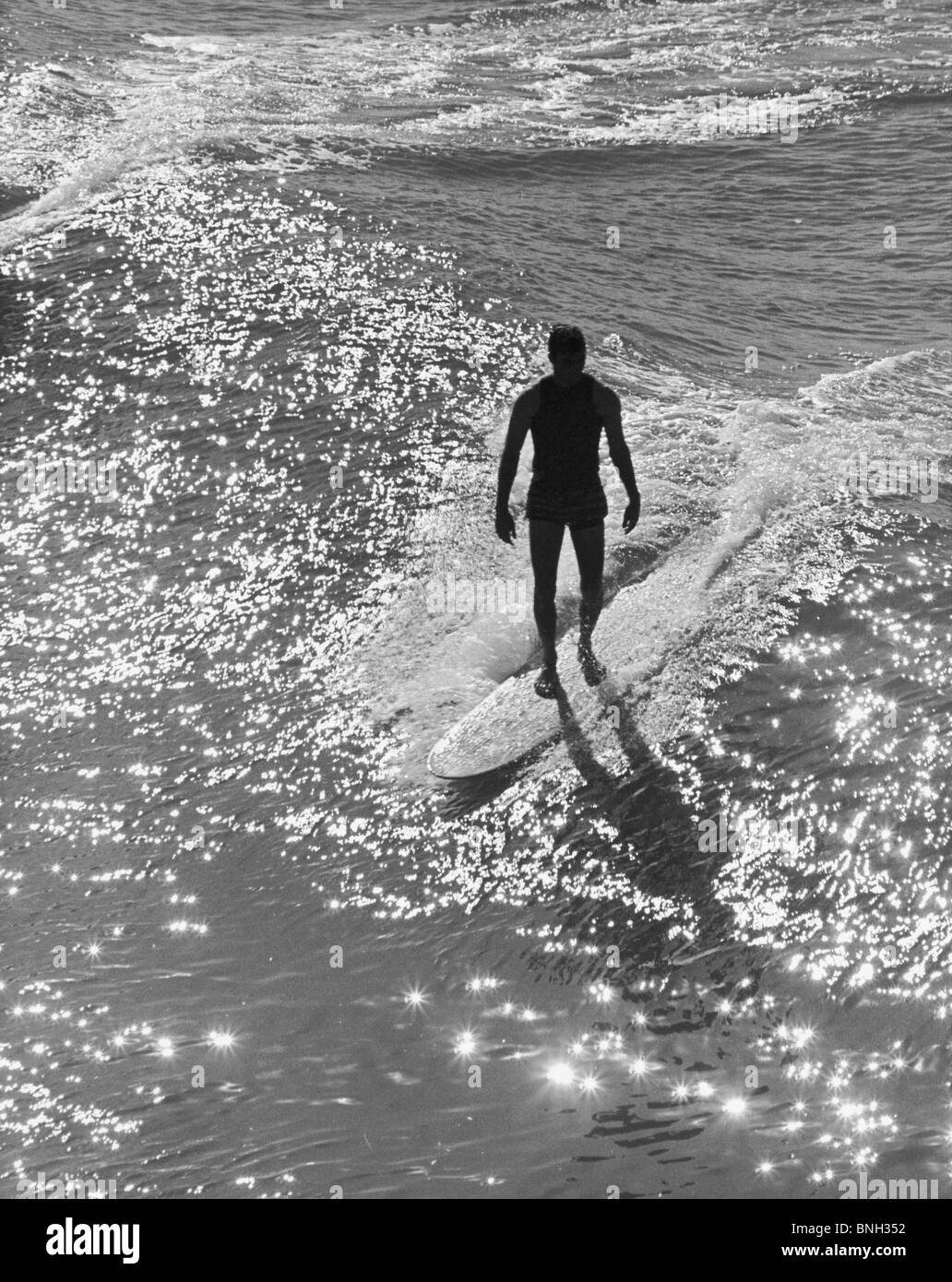 Person surfing on sea Black and White Stock Photos & Images - Alamy