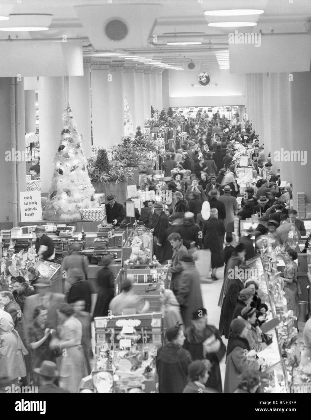 High angle view of a group of people shopping in a department store at ...