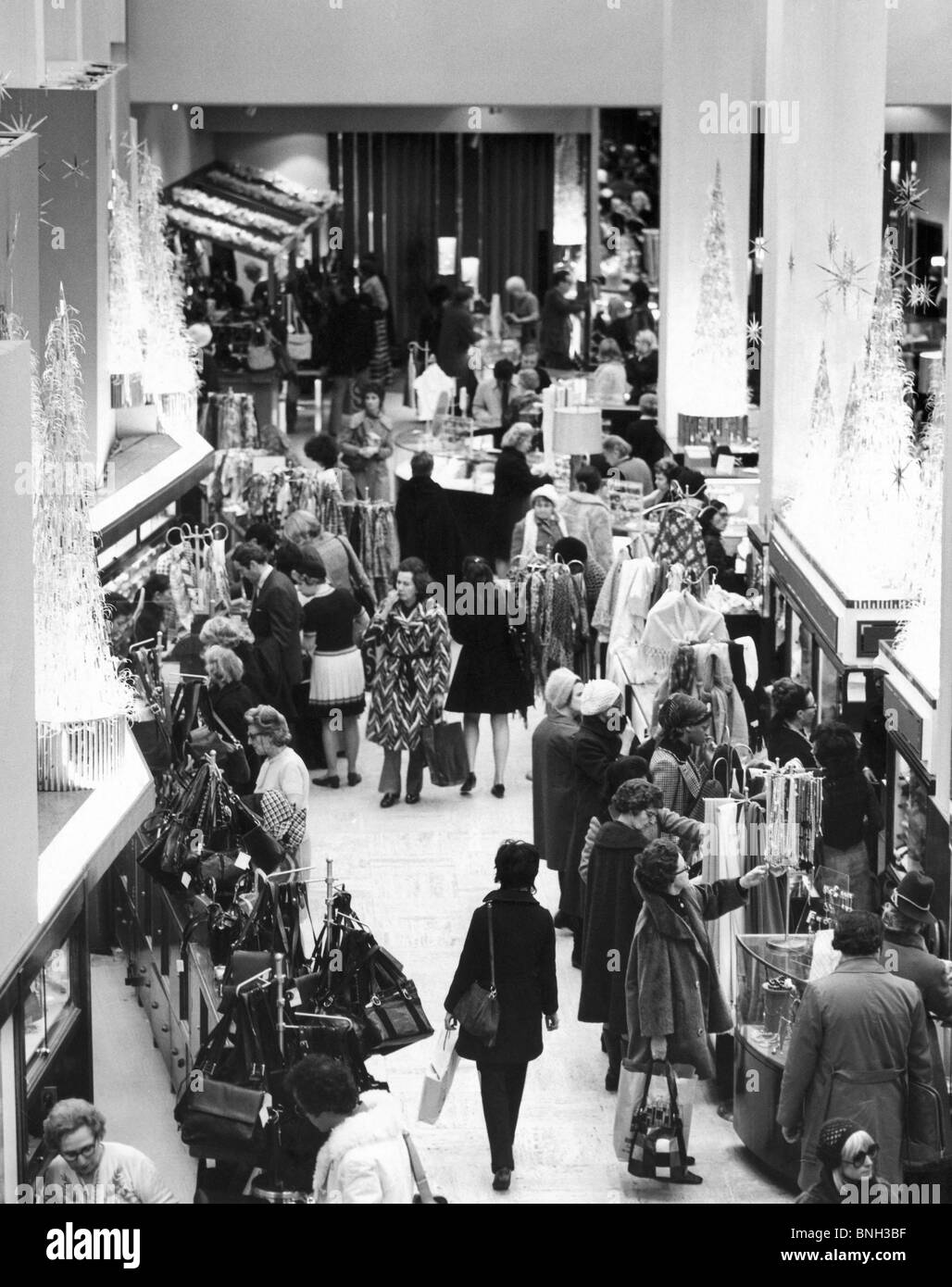 High angle view of a group of people shopping in a department store ...