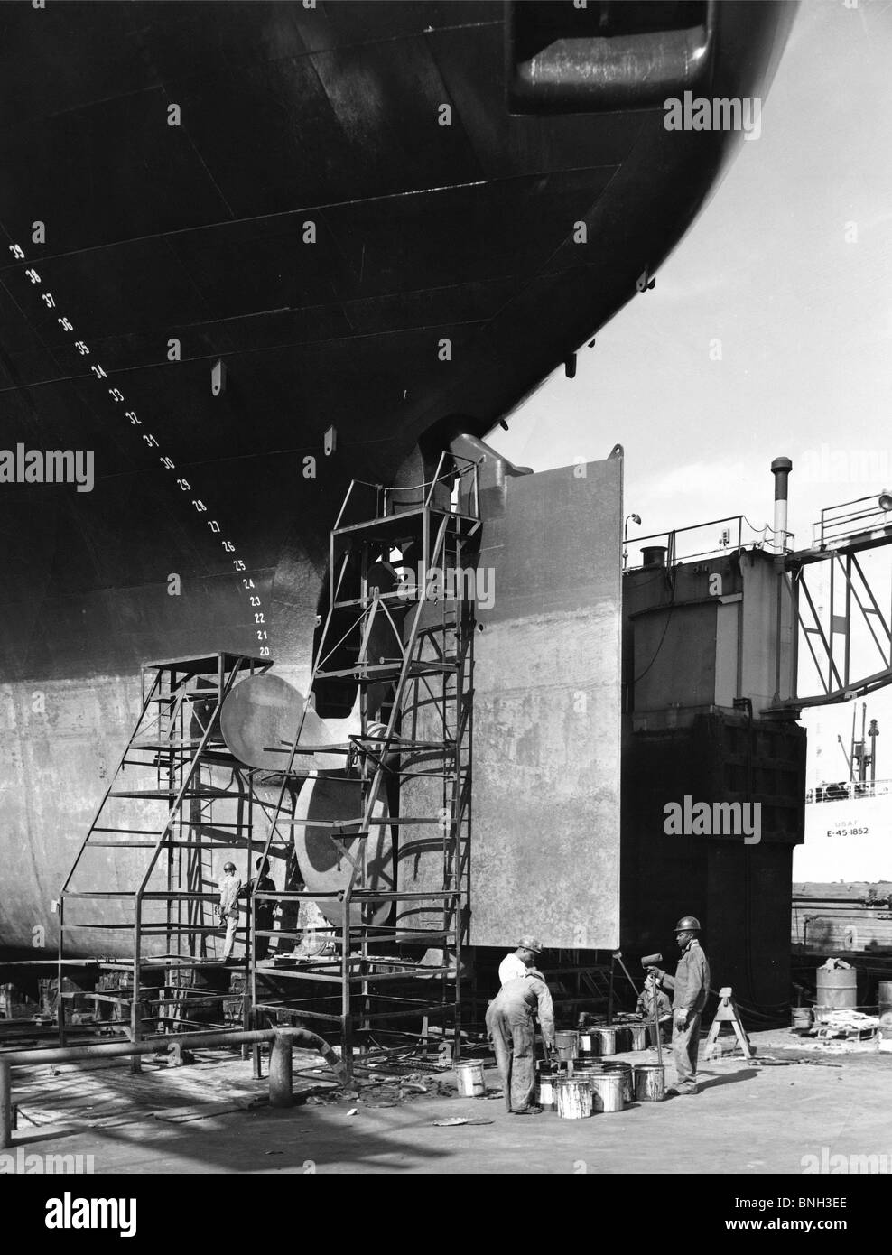 Christmas gift near tree Black and White Stock Photos & Images - Alamy