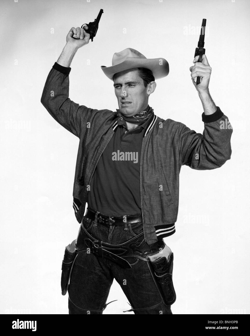 Cowboy Shooting Two Guns