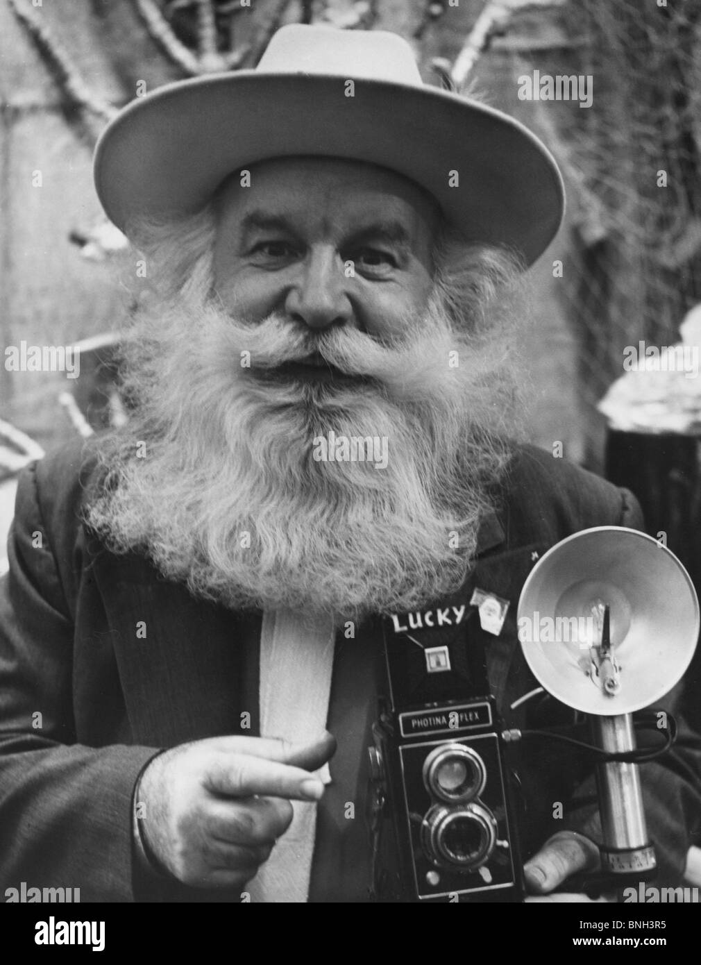Person holding camera vintage Black and White Stock Photos & Images - Alamy