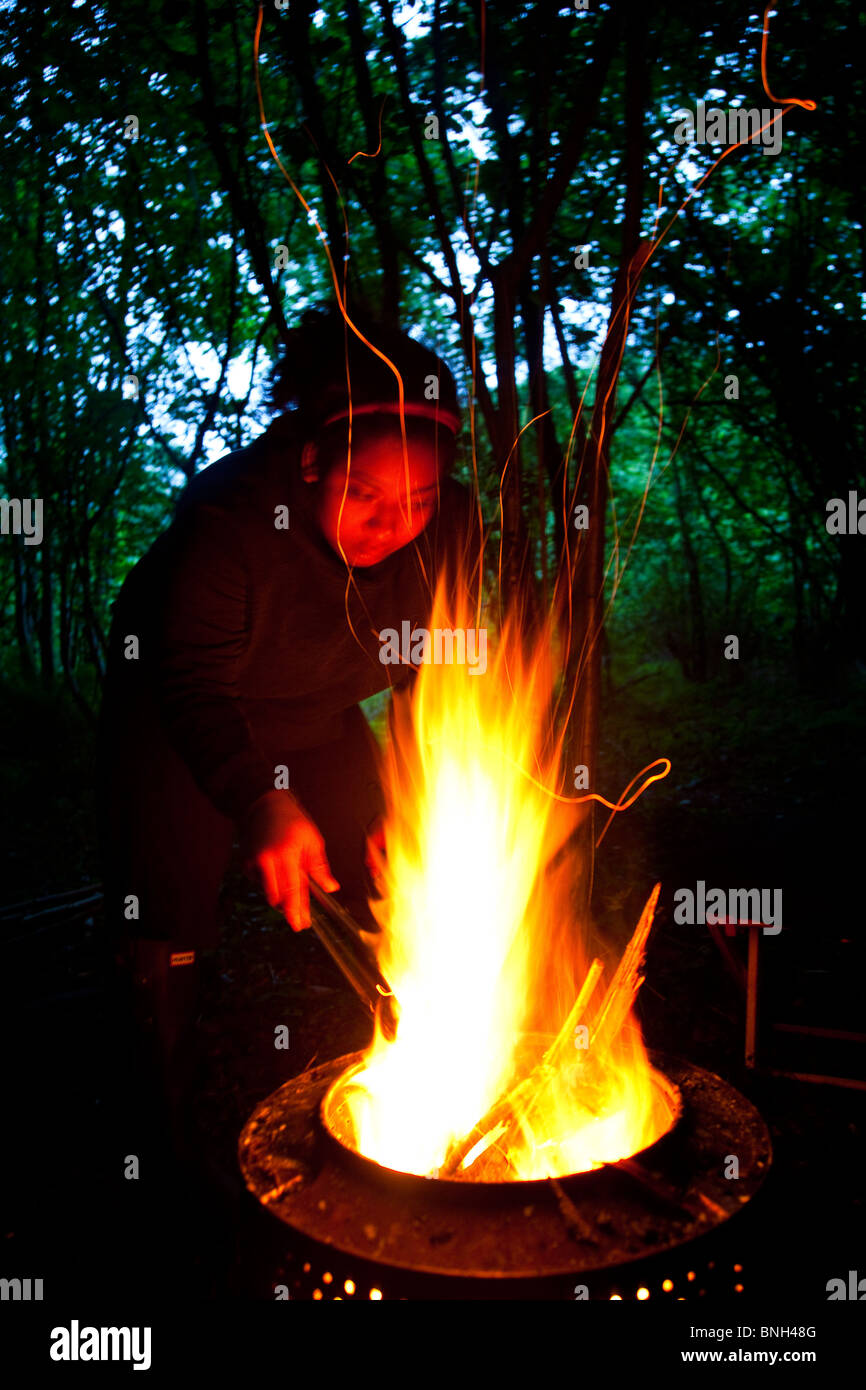 Woman cooking over open fire hi-res stock photography and images - Alamy