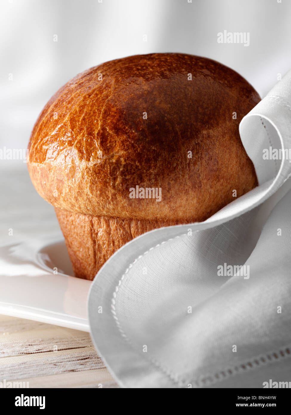 brioche on plate with white napkin Stock Photo - Alamy