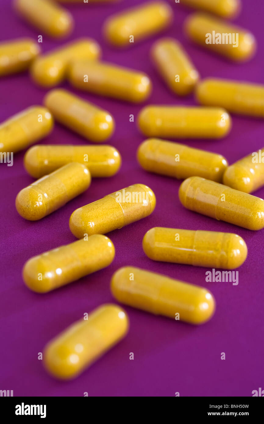 Purple capsules hi-res stock photography and images - Alamy