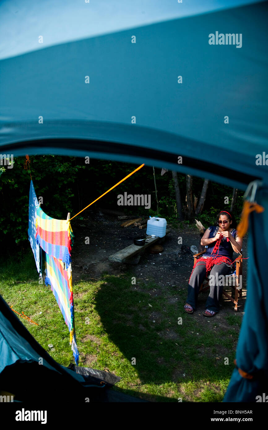 Woman knitting when camping in Kent Stock Photo - Alamy