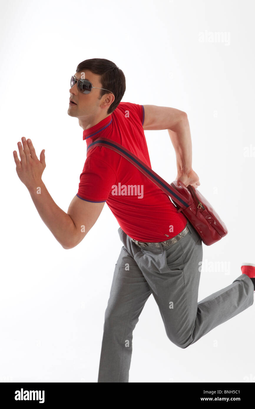young man on white back ground in red top and a man bag Stock Photo - Alamy
