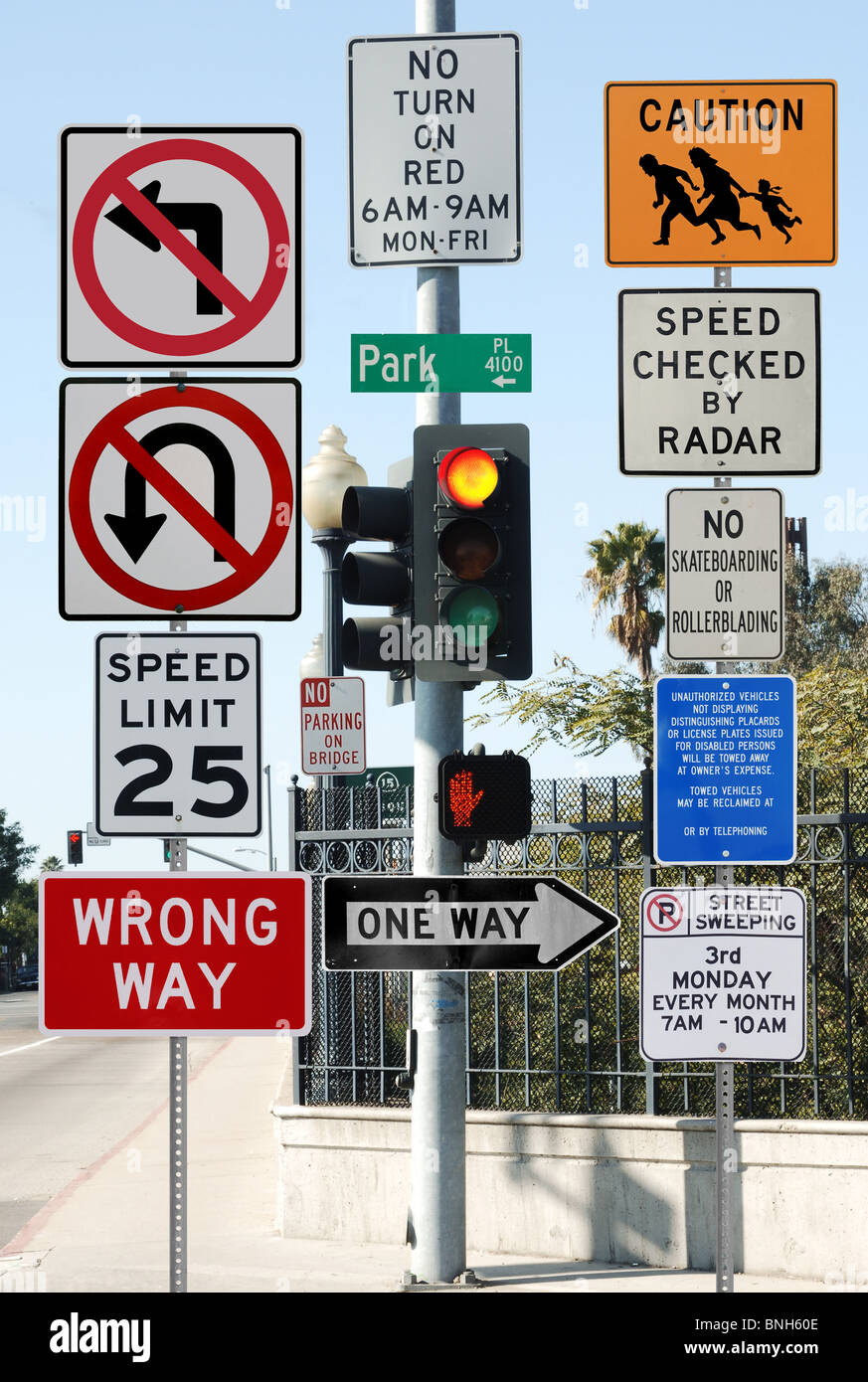 Street intersection congested with street signs Stock Photo - Alamy