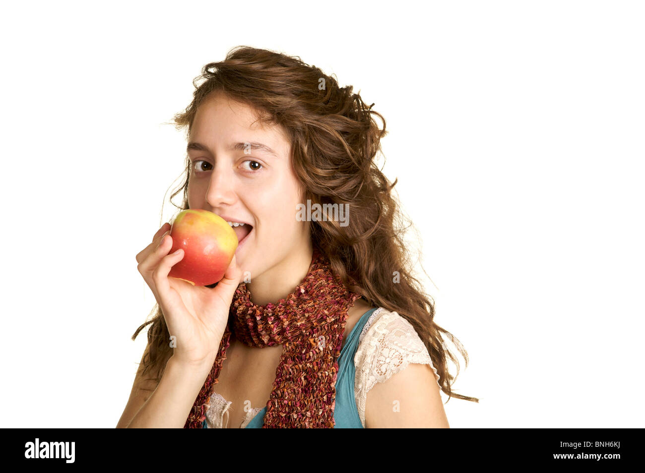 Girl taking bite apple apple hi-res stock photography and images - Alamy