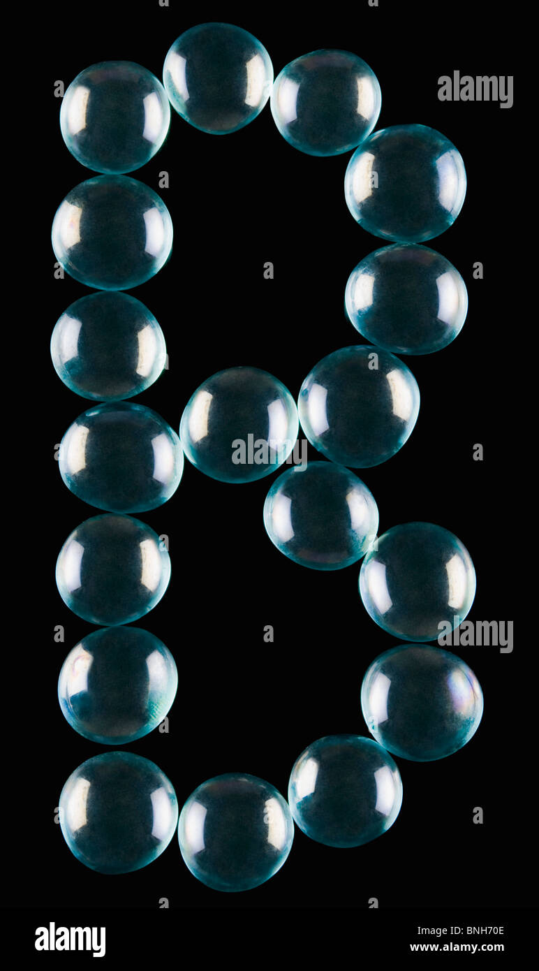 Close-up of marble balls arranged in the shape of letter B Stock Photo ...