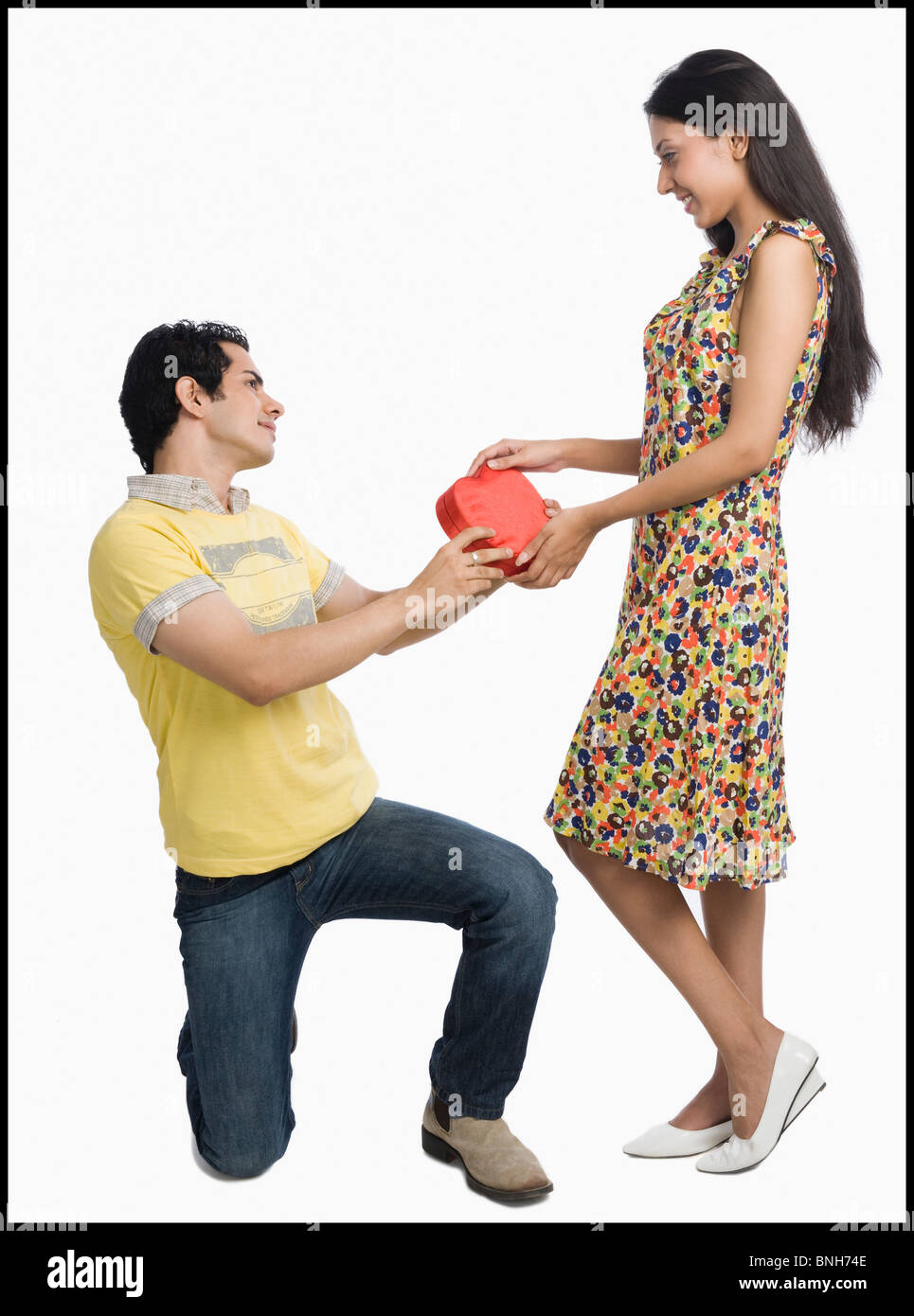 Man proposing to a woman Stock Photo - Alamy