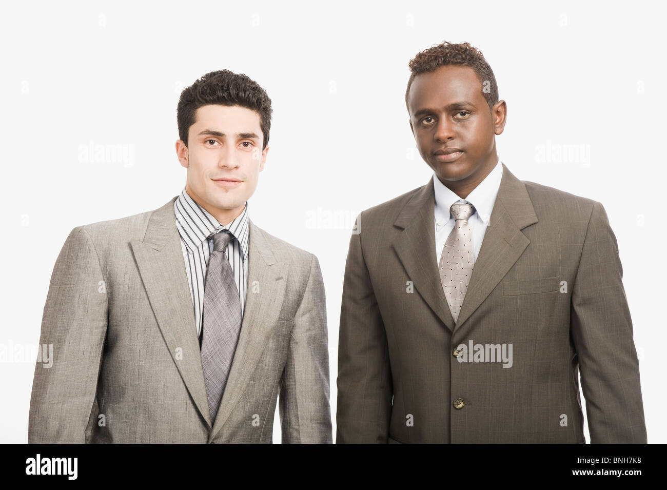 Portrait of two businessmen standing together Stock Photo - Alamy