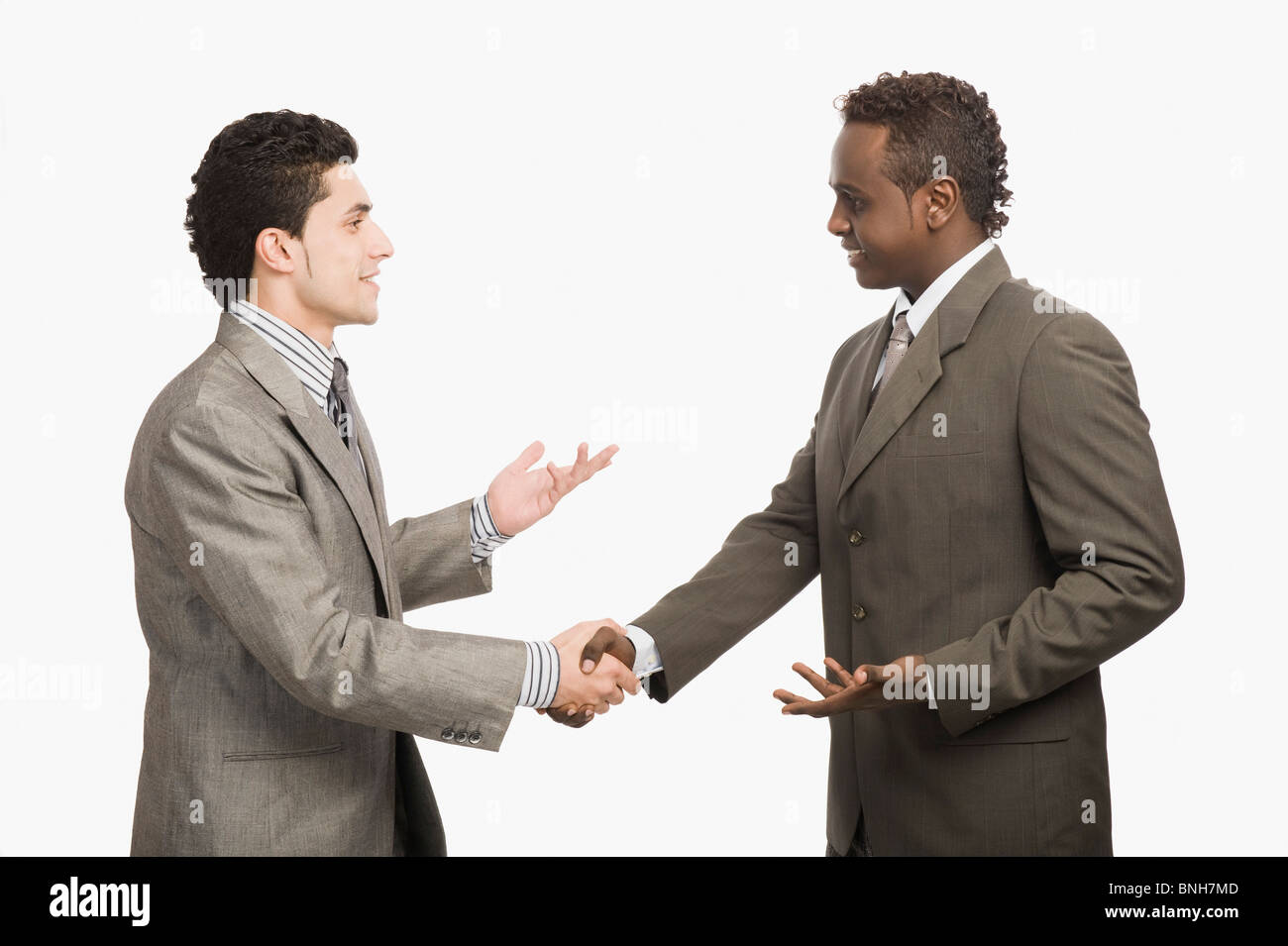Shaking hand gesture multi Cut Out Stock Images & Pictures - Alamy