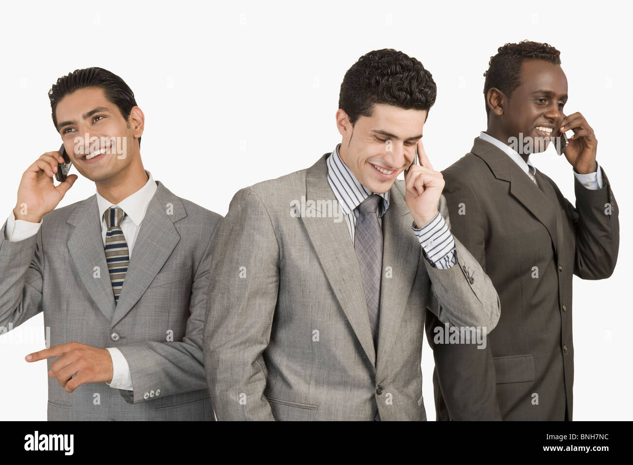 Group people holding phones up adults hi-res stock photography and ...