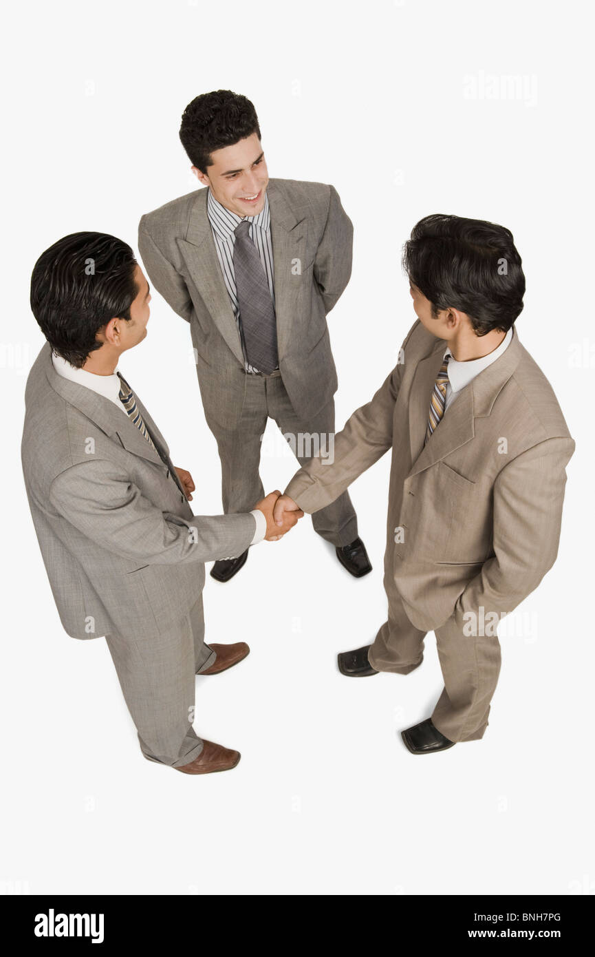 Indian white hands shaking Cut Out Stock Images & Pictures - Alamy