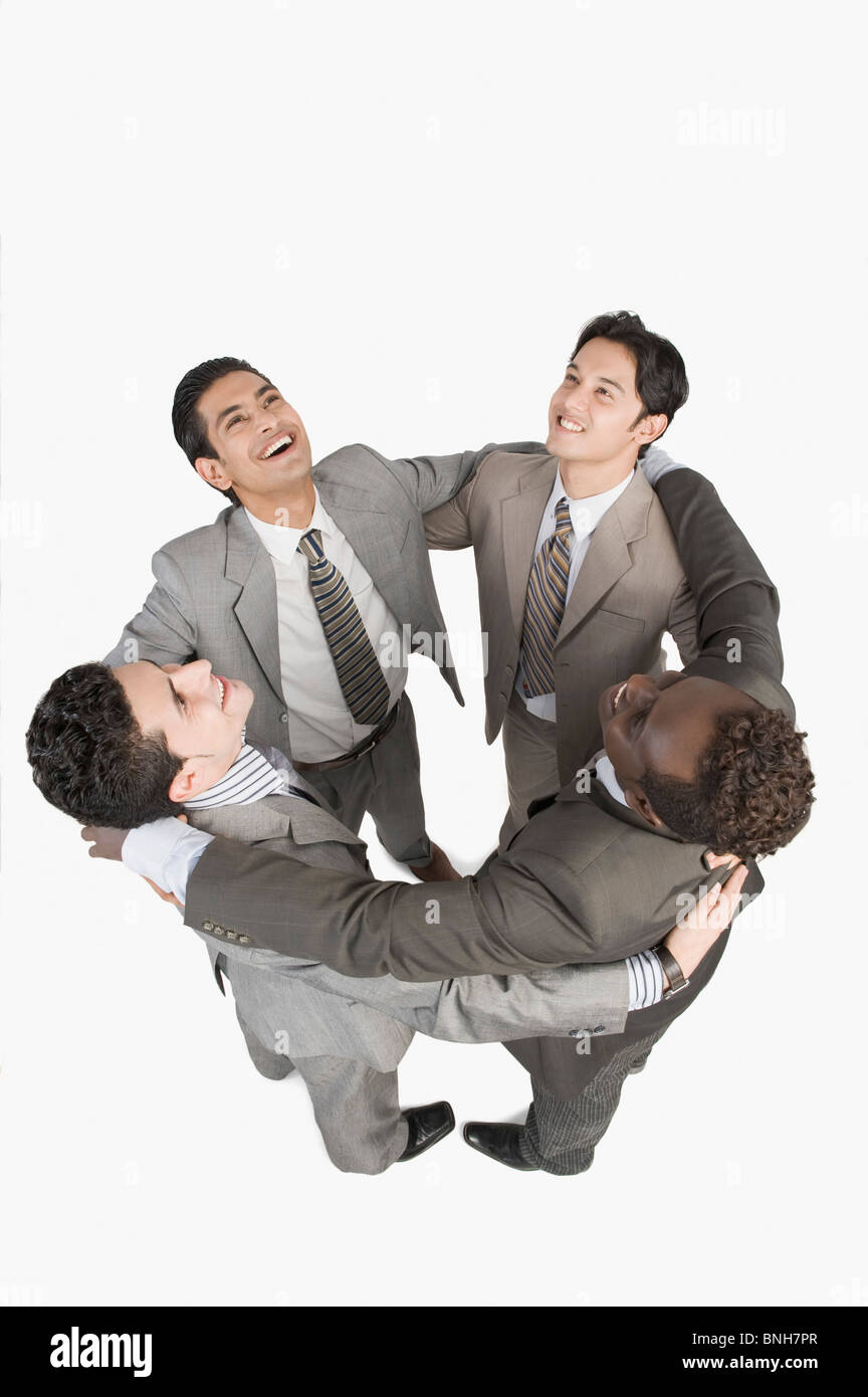 Businessmen standing in a circle Stock Photo - Alamy