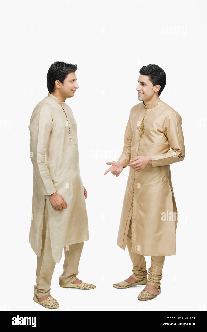 Two men talking with each other Stock Photo - Alamy