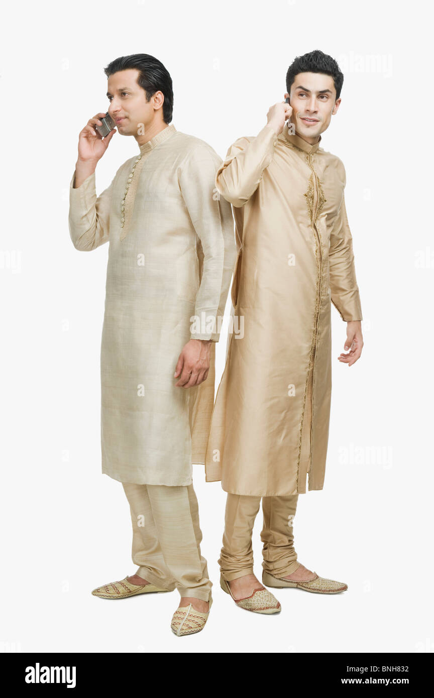 Two indian people talking Cut Out Stock Images & Pictures - Alamy