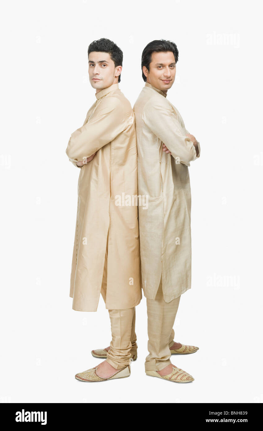 Two men posing with arms crossed Stock Photo - Alamy