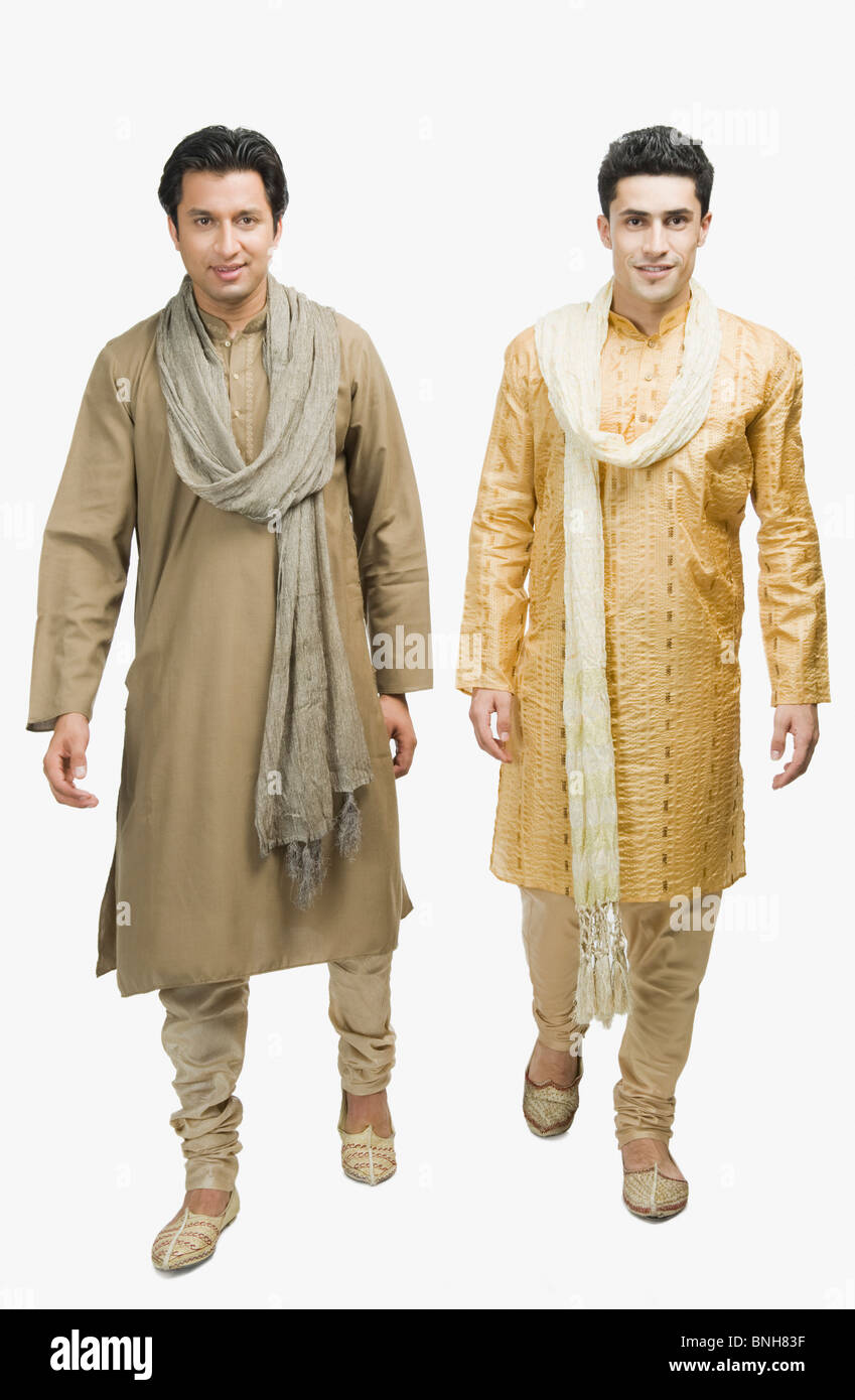 Two men walking together Stock Photo - Alamy