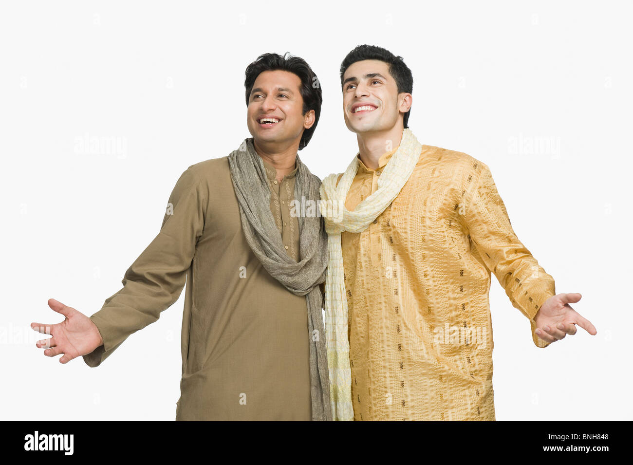 Two friends smiling together Stock Photo - Alamy
