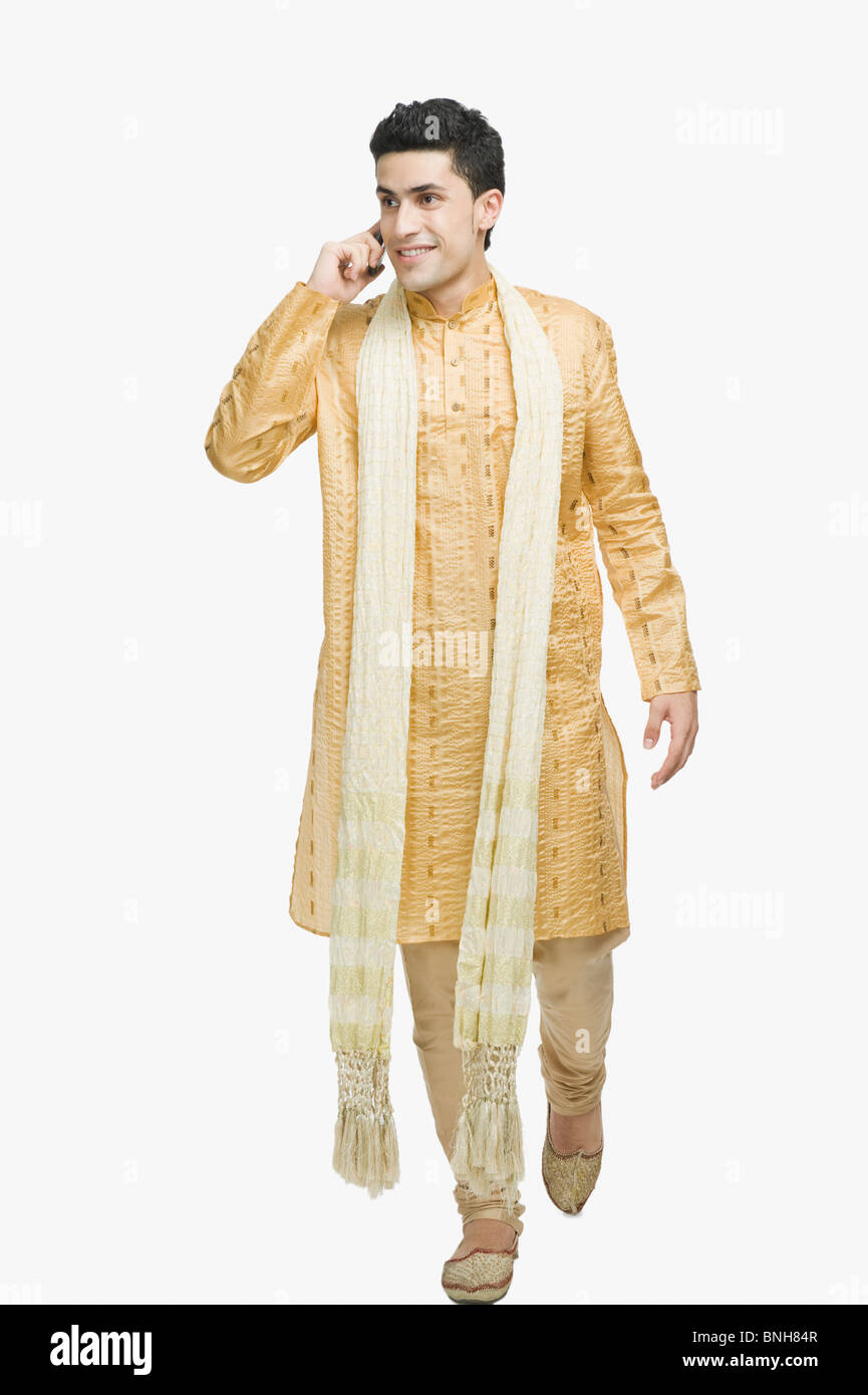 Walking man with phone Cut Out Stock Images & Pictures - Alamy