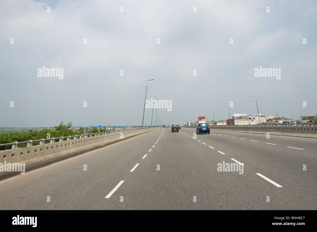Vehicles on a highway, National Highway 8, New Delhi, India Stock Photo ...