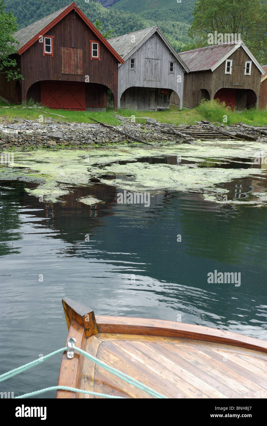 Boathouses & wooden rowing boat, Tafjord, Norddal, Møre og Romsdal ...