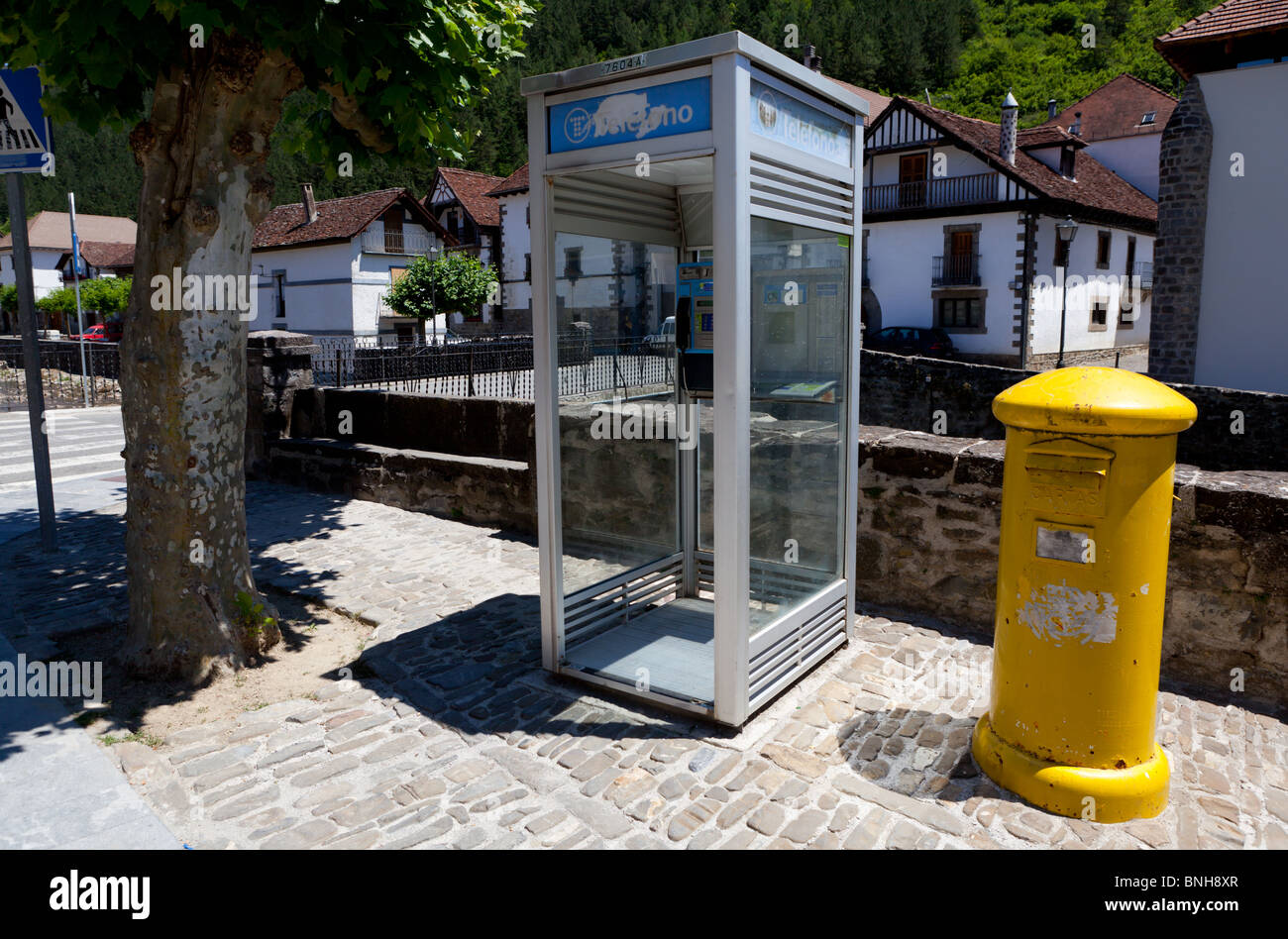 A Spanish telephone box and post box in the village of Ochagavia ...