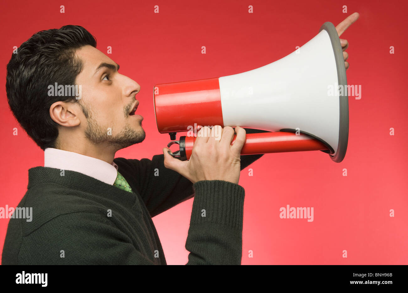 Businessman with a megaphone Stock Photo - Alamy
