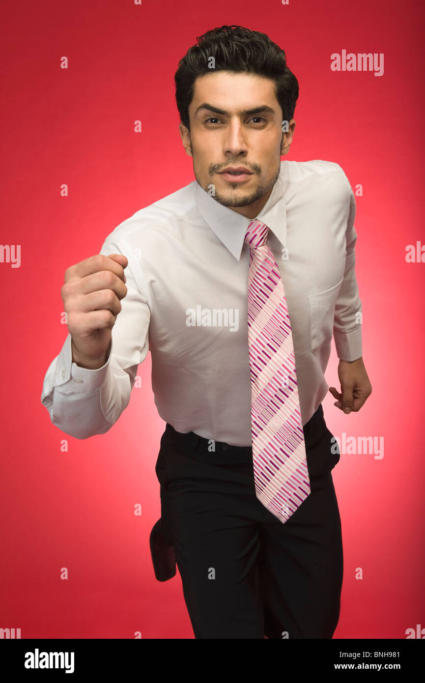 Indian businessman running hi-res stock photography and images - Alamy