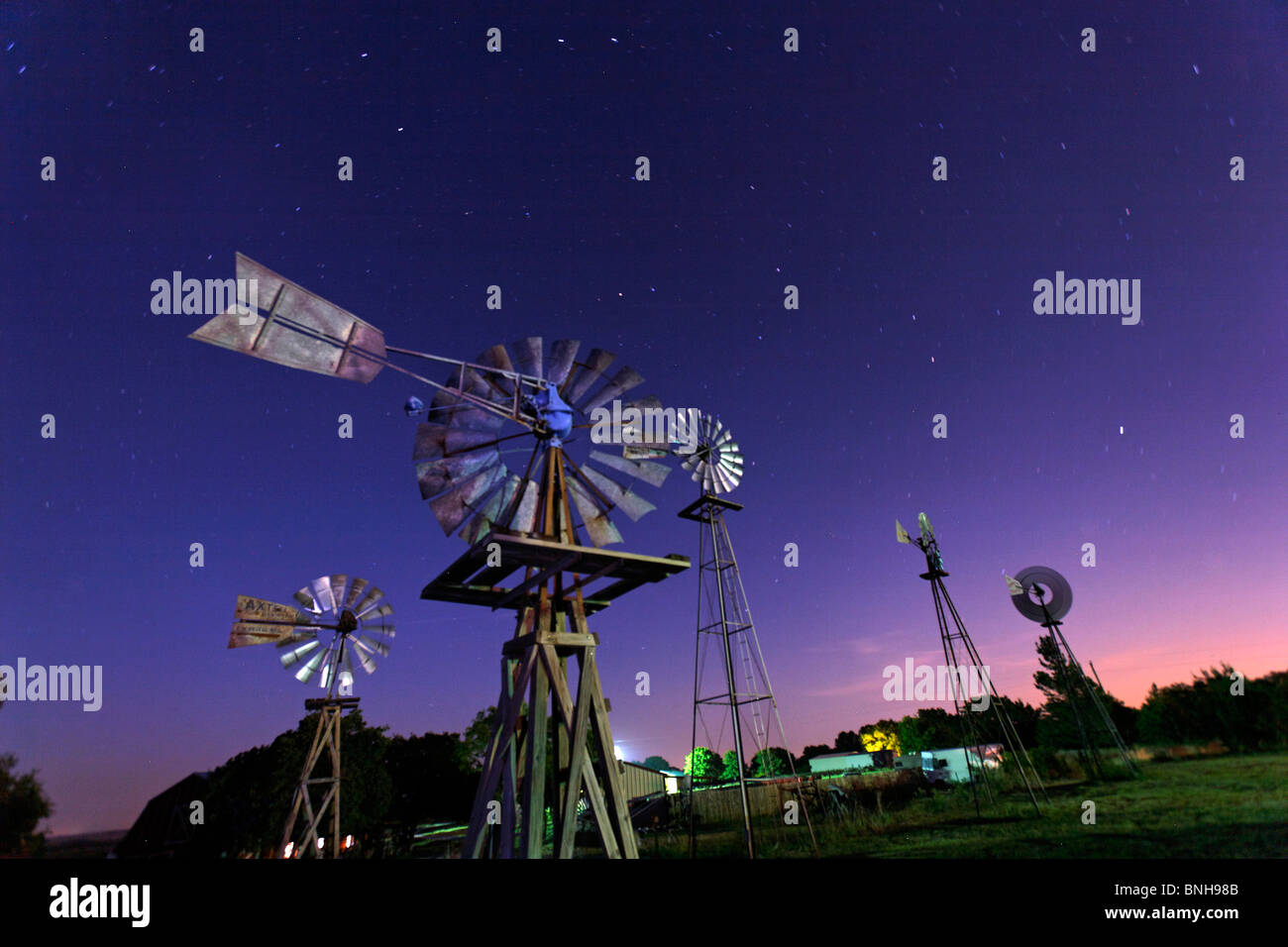USA Texas Tolar Windmill Farm wind wheels wind turbines by night sky ...
