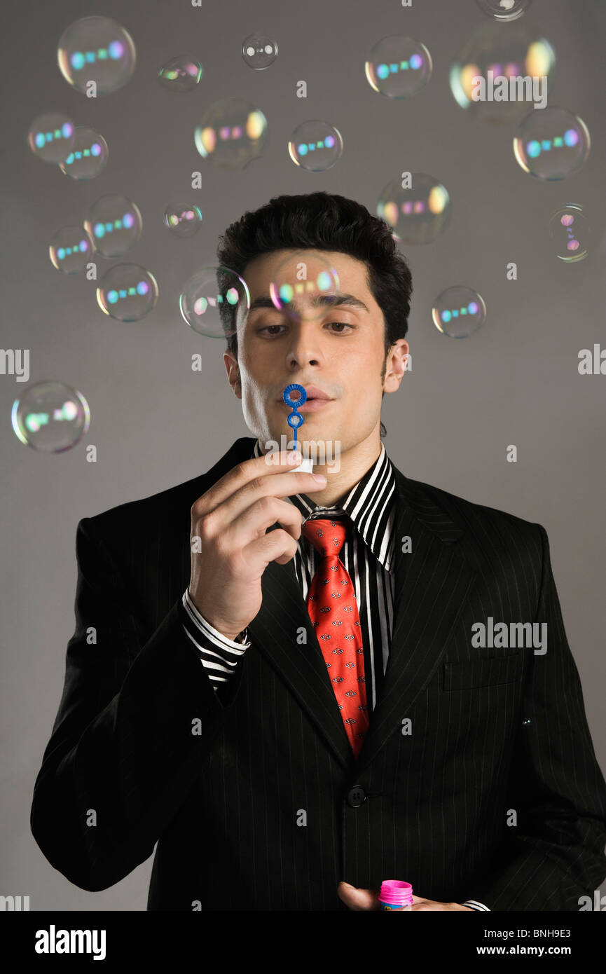 Indian man blowing bubbles hi-res stock photography and images - Alamy