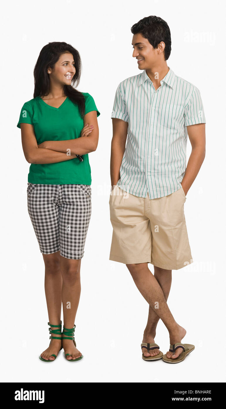 Couple smiling at each other Stock Photo - Alamy