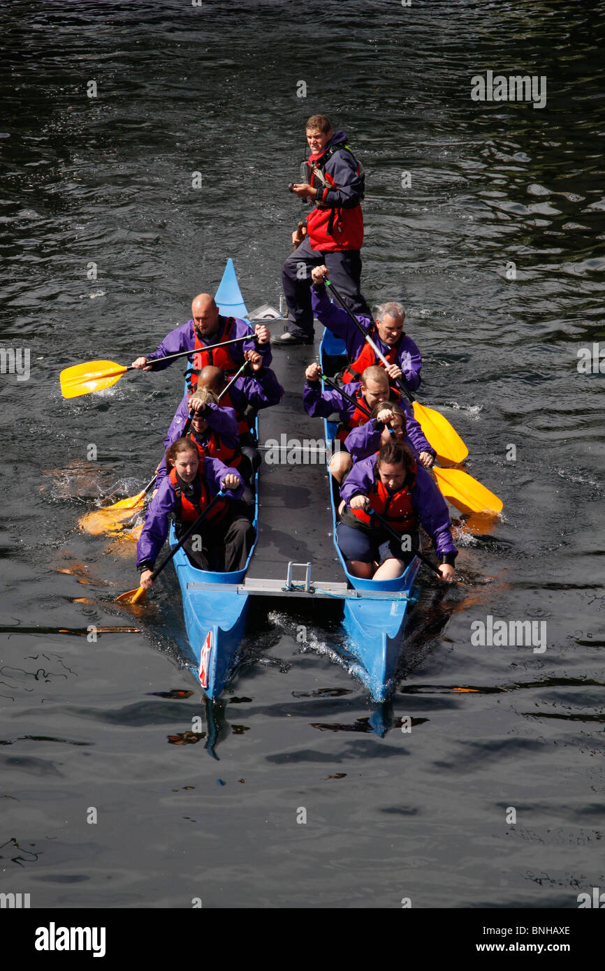 Training in a multi man canoe competition Stock Photo - Alamy