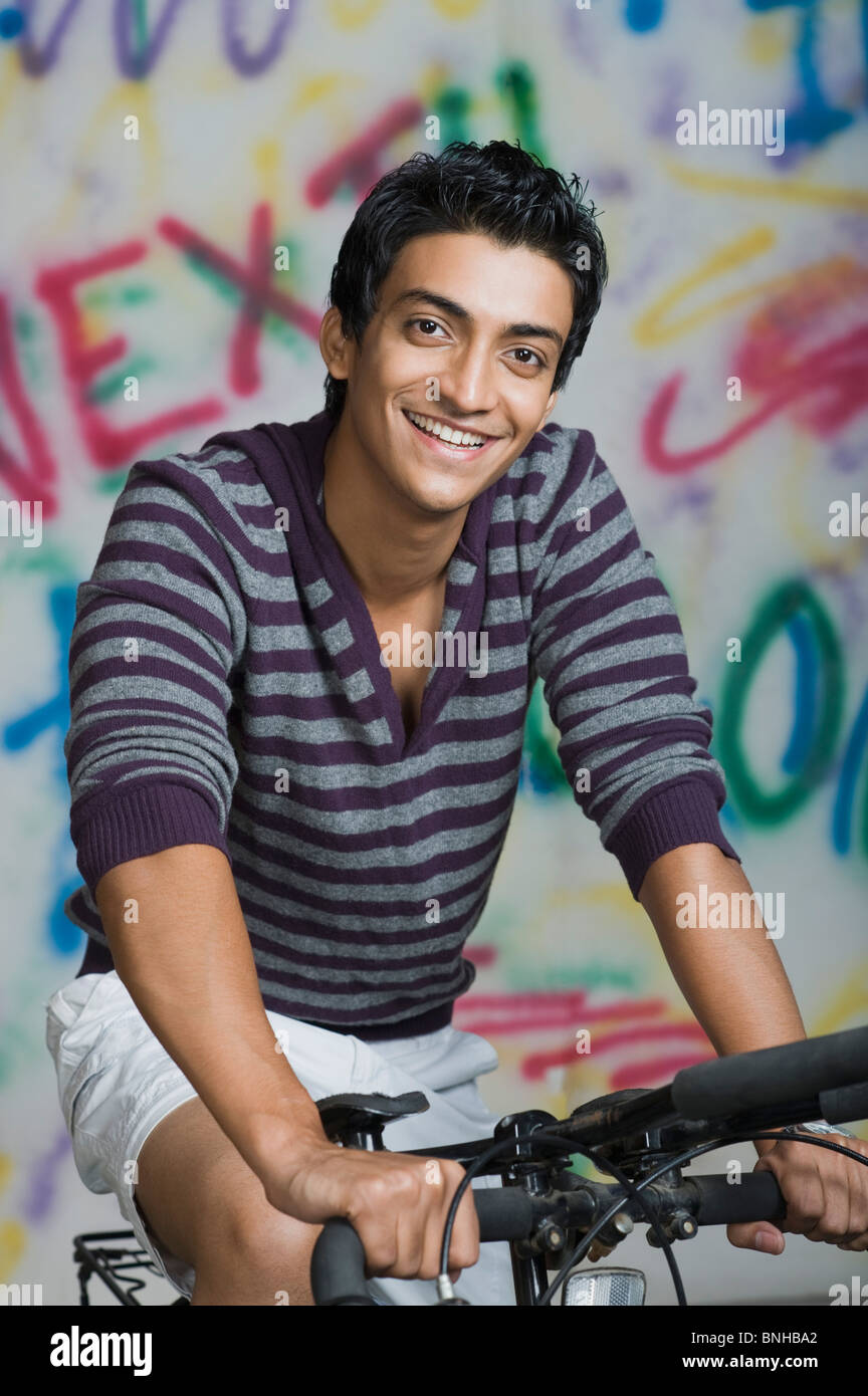 Portrait of a man cycling Stock Photo - Alamy