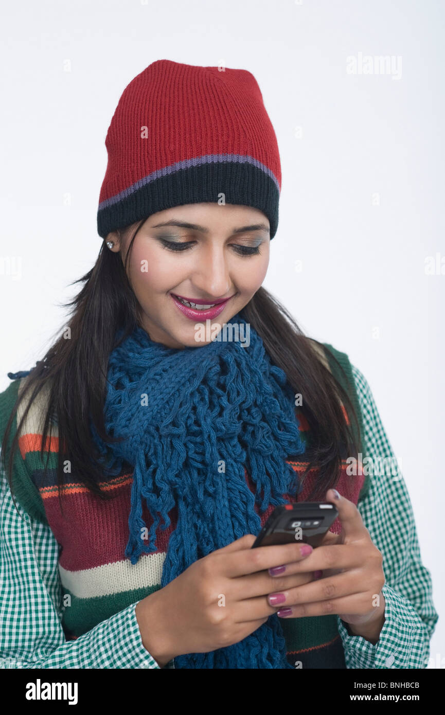 Woman text messaging on a mobile phone Stock Photo - Alamy