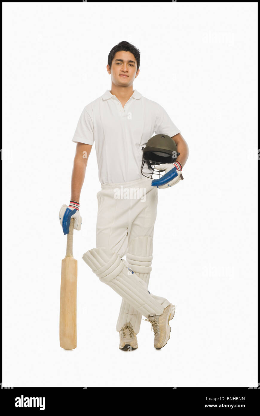 Portrait cricket batsman standing bat hi-res stock photography and ...