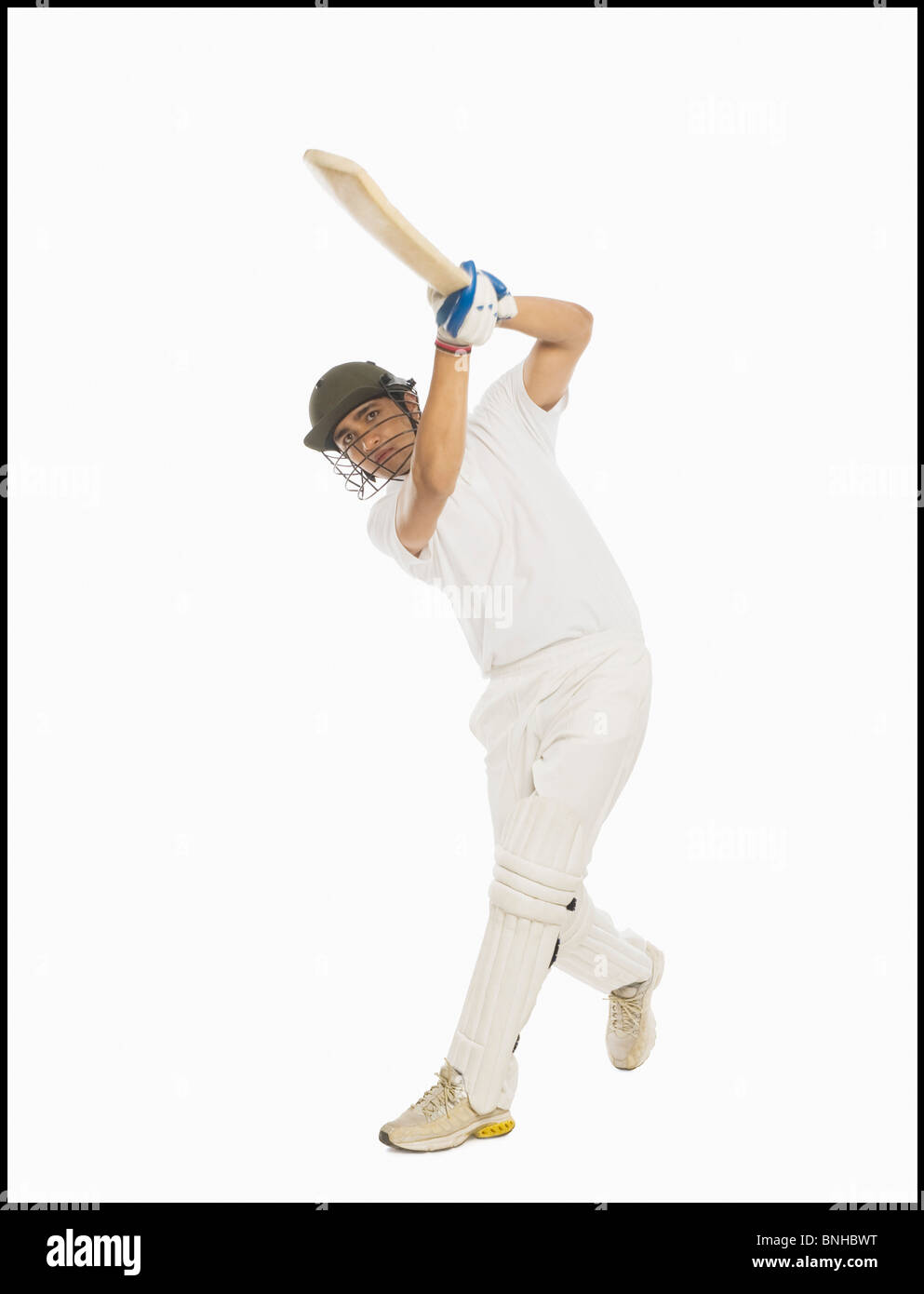 Cricket batsman playing a straight drive Stock Photo - Alamy