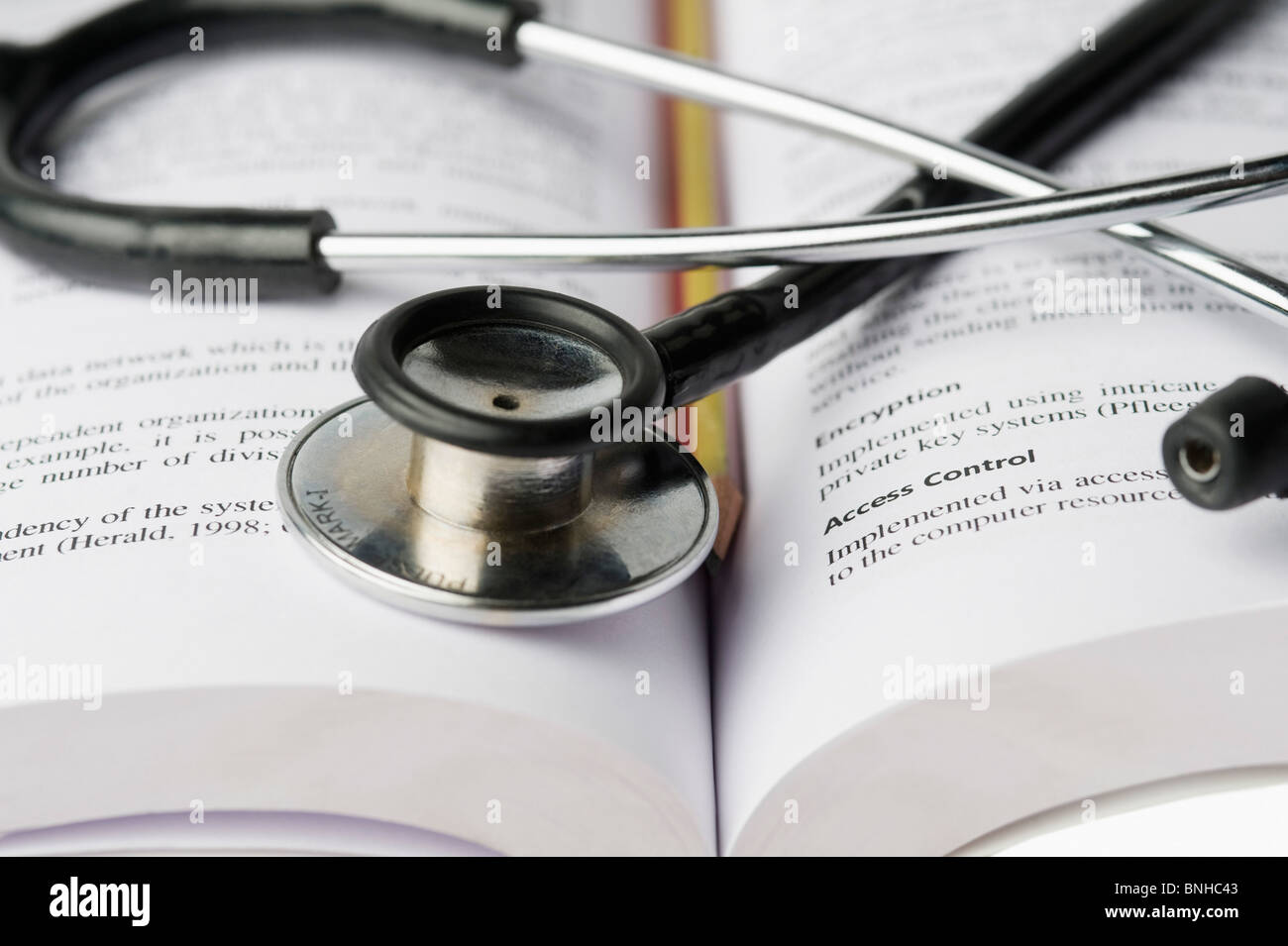 Close-up of a stethoscope on an open book Stock Photo - Alamy