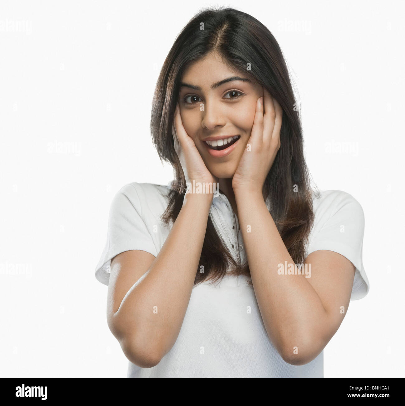 Portrait of a woman looking surprised Stock Photo - Alamy