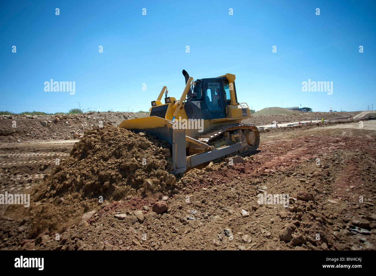 Bulldozer on road construction site Stock Photo - Alamy