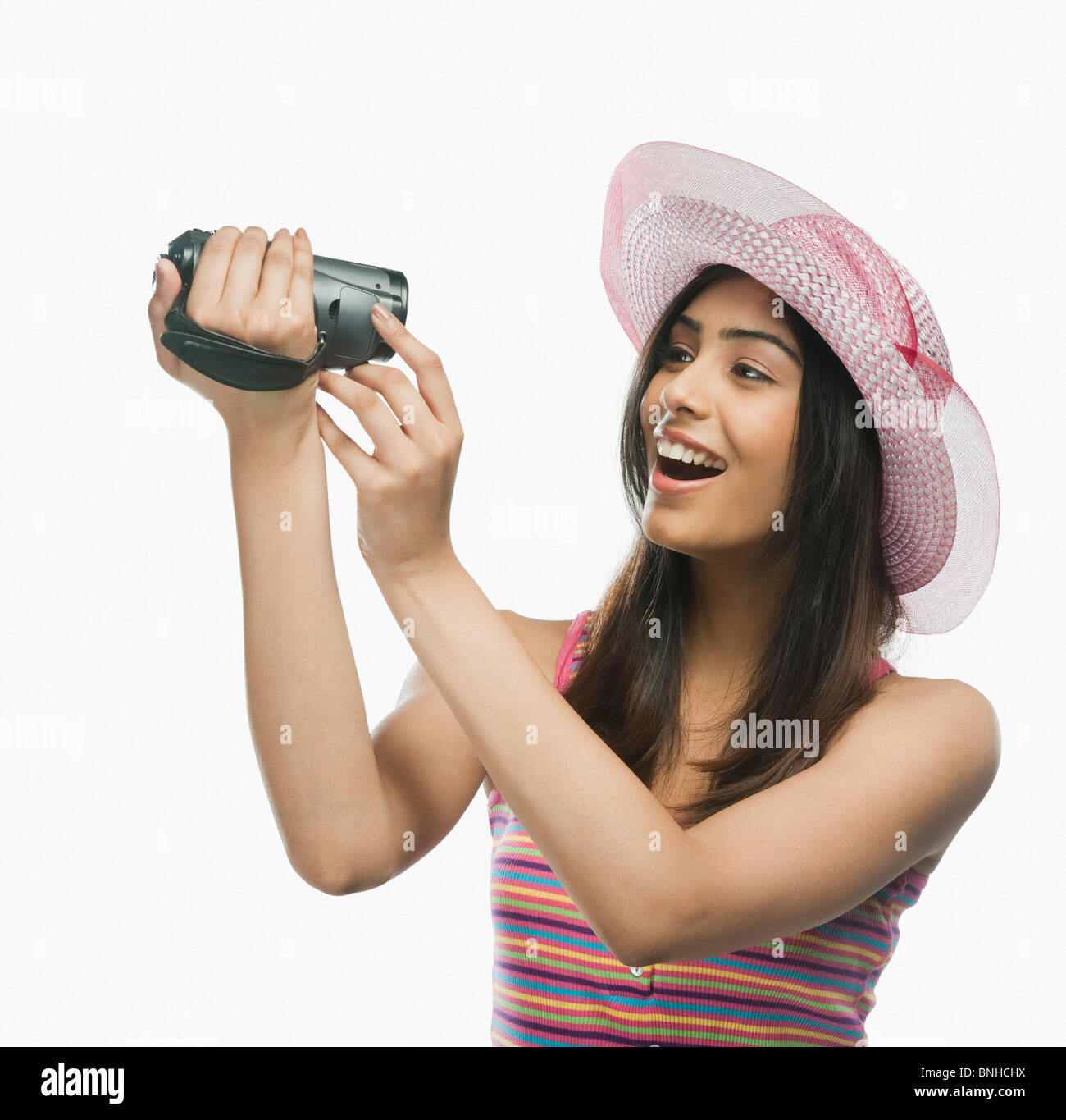 Close-up of a woman filming herself with a home video camera Stock ...