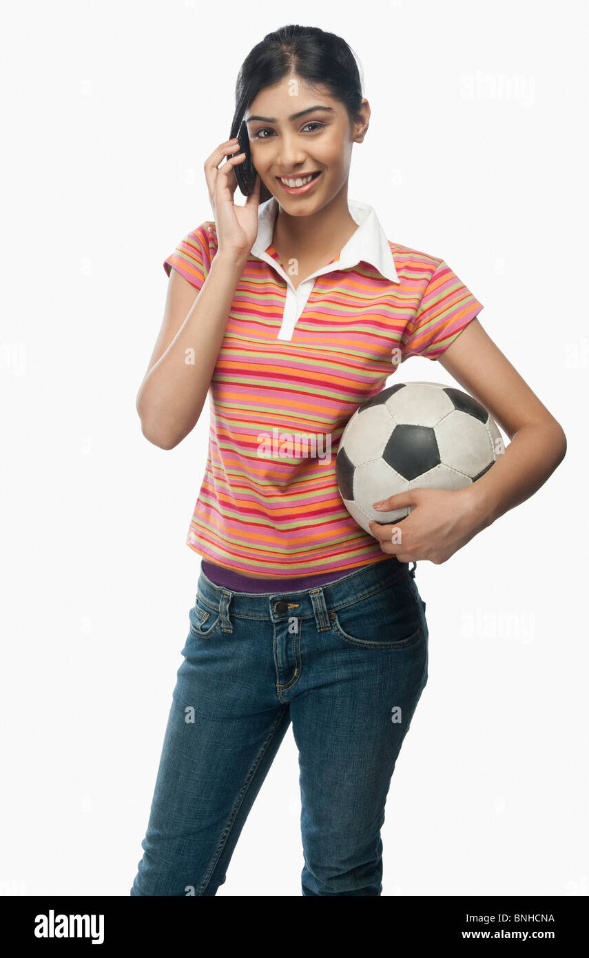 Sports football woman phone hi-res stock photography and images - Alamy