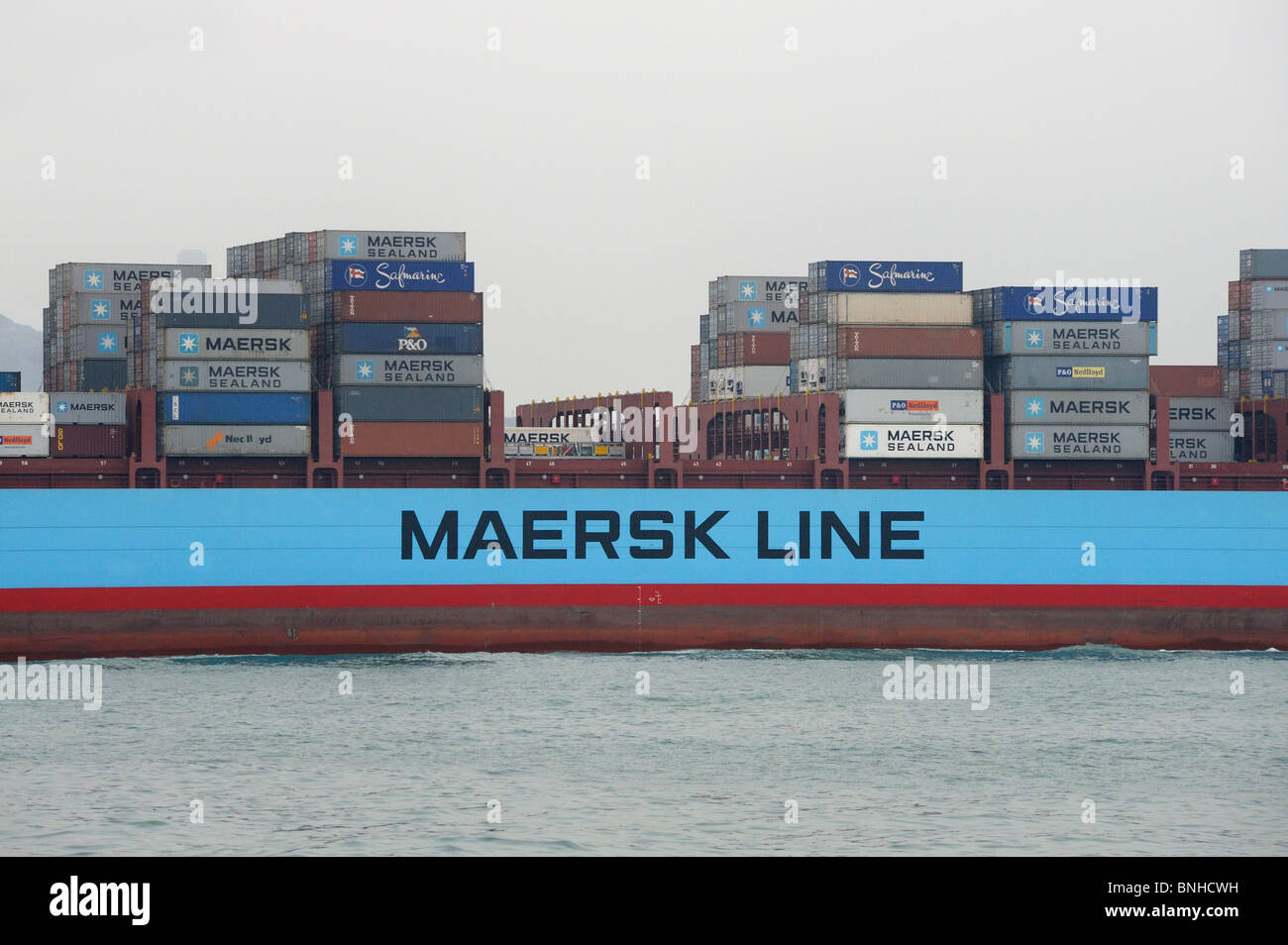Hong Kong, Container ship from Maersk moving through the Lamma Channel ...