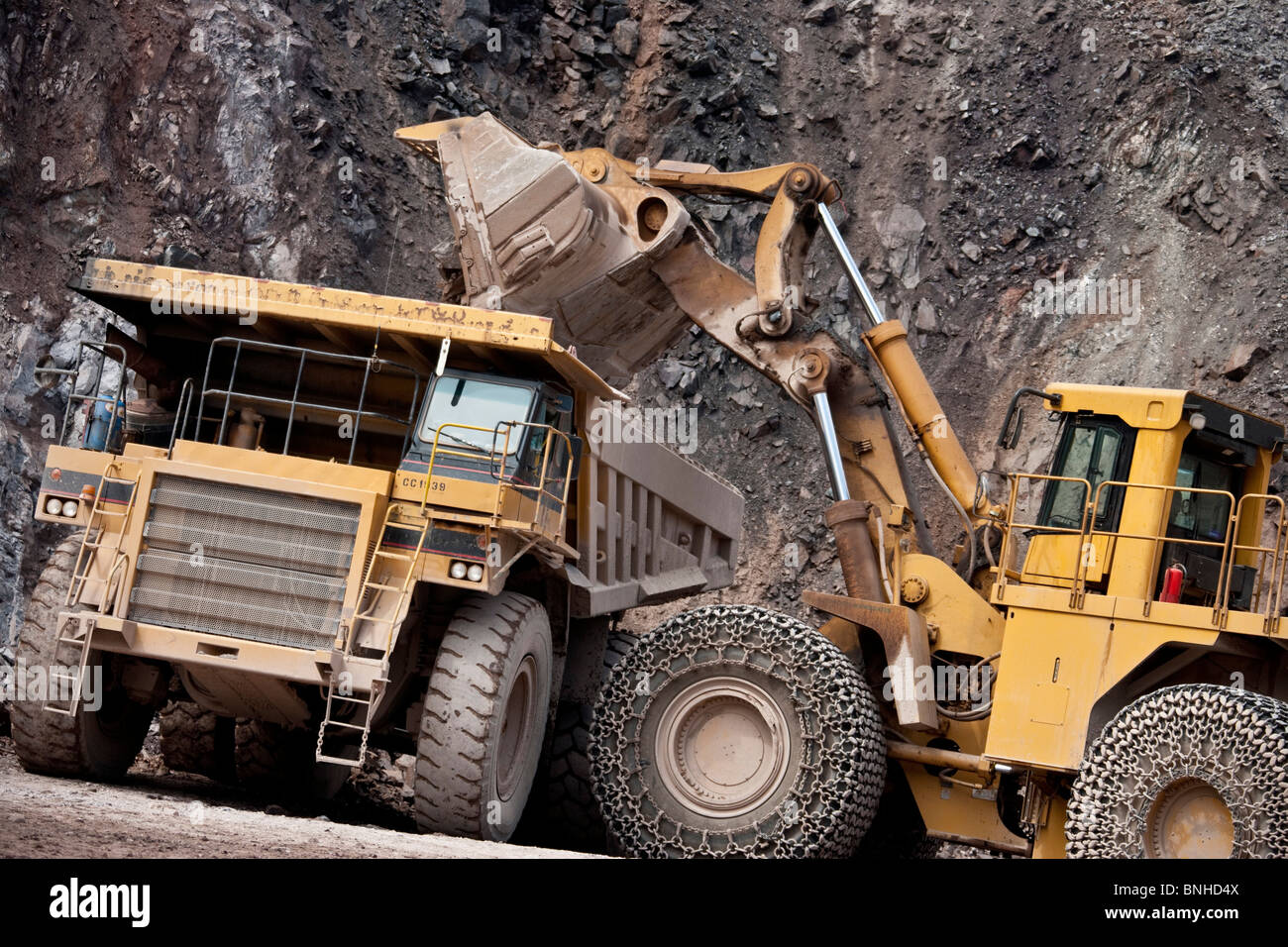 Large wheel dozer in open cast mine Stock Photo - Alamy
